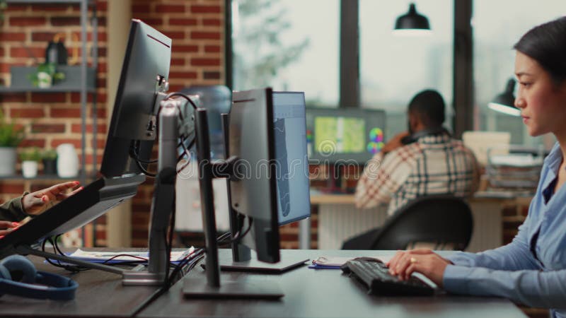 Diverse Coworkers Working on Software Development on Multi Monitors ...