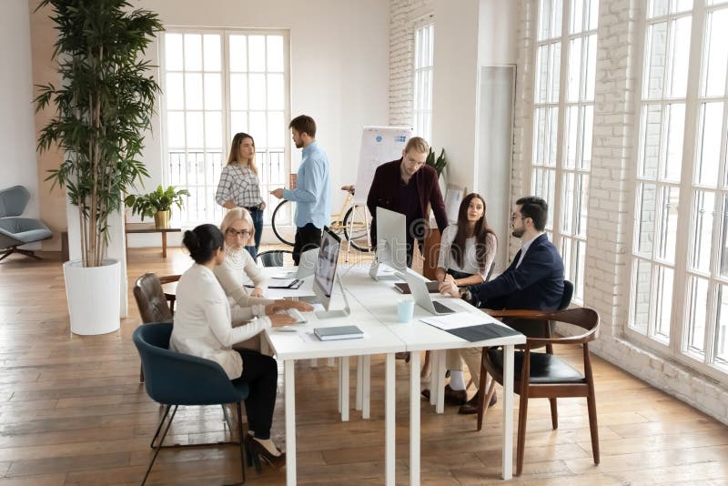 Diverse Employee Work Cooperate in Modern Office Together Stock Photo ...