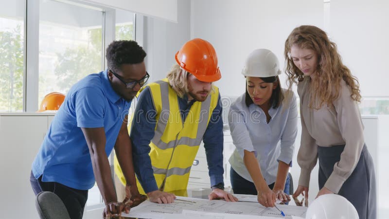 Diverse Engineering Team Meeting To Discuss Architectural Project and ...