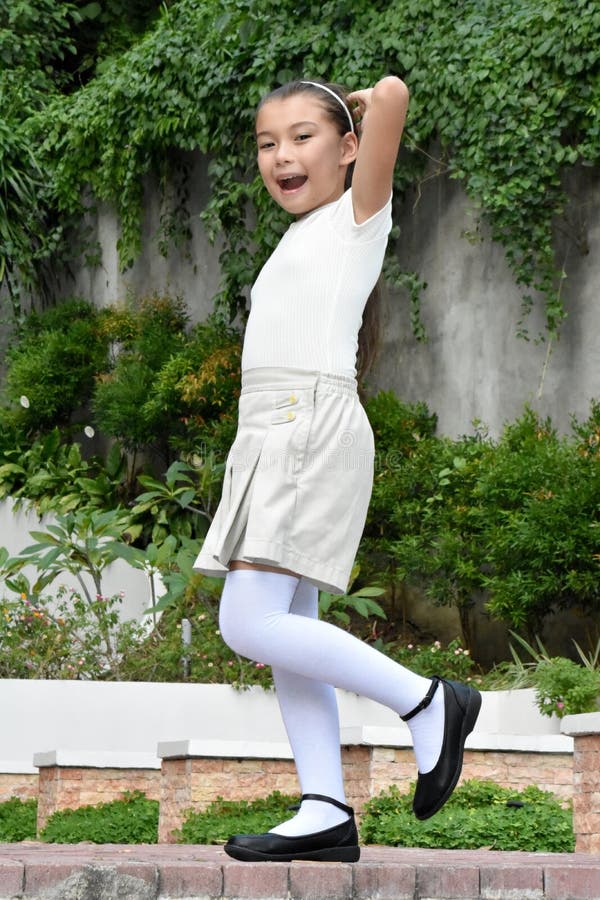 Diverse Female Child Posing Wearing Skirt Standing Stock Image - Image ...