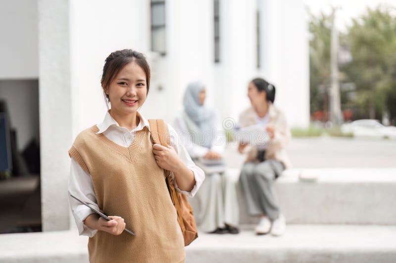 Diverse Female Student Smiling Holding Notebooks Campus Stock Photos ...