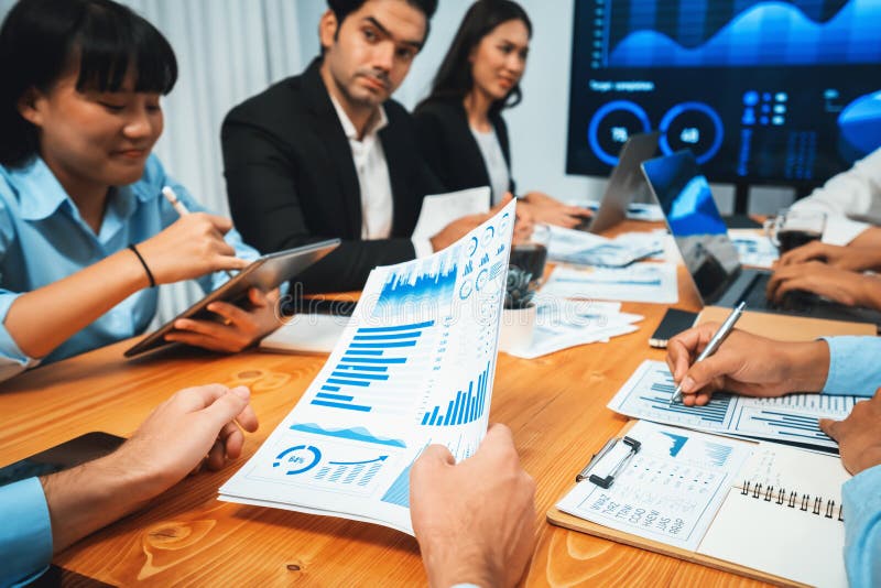 Group of Business Analyst Team Analyzing Financial Data Report ...