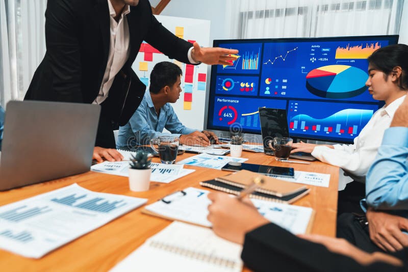 Group of Business Analyst Team Analyzing Financial Data Report ...