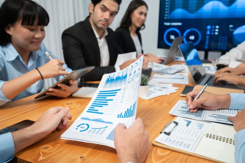 Group of Business Analyst Team Analyzing Financial Data Report ...