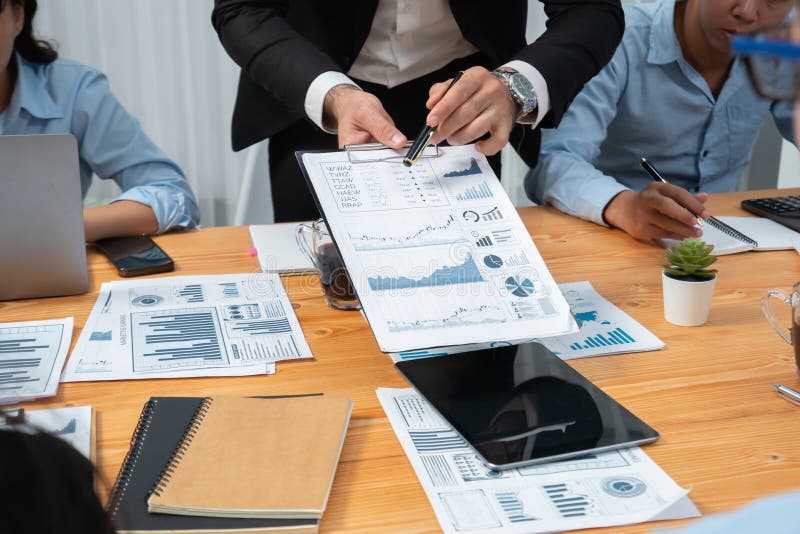 Group of Business Analyst Team Analyzing Financial Data Report ...