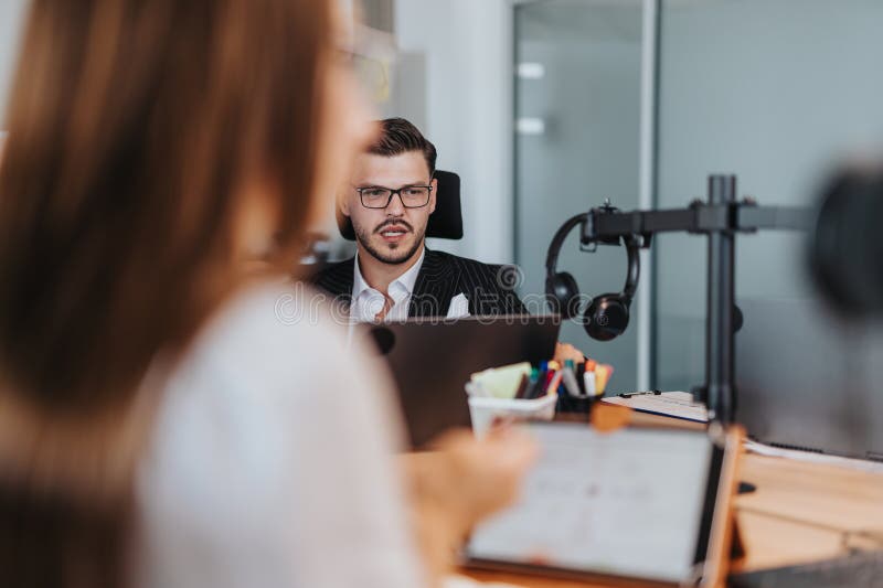 A Diverse Group of Business Employees Working Collaboratively in a ...