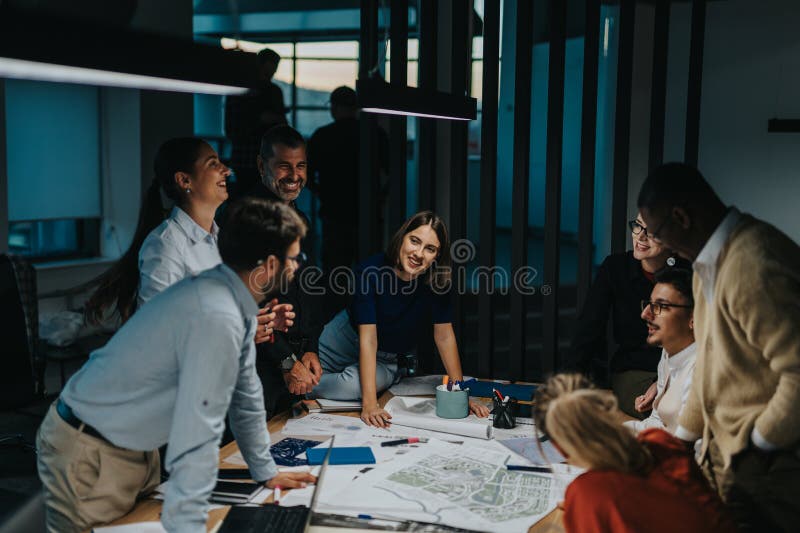 Diverse Group of Business People Gather Around a Table, Actively ...