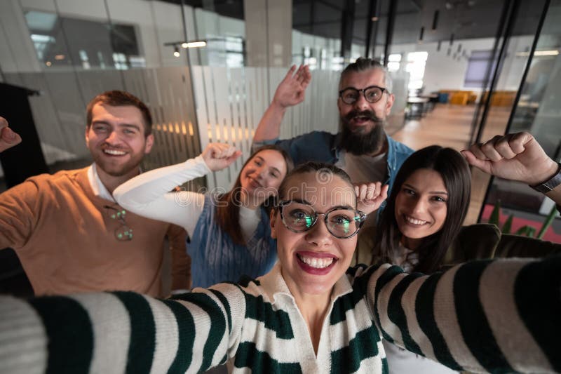A Diverse Group of Business Professionals Take a Break from Their Tasks ...