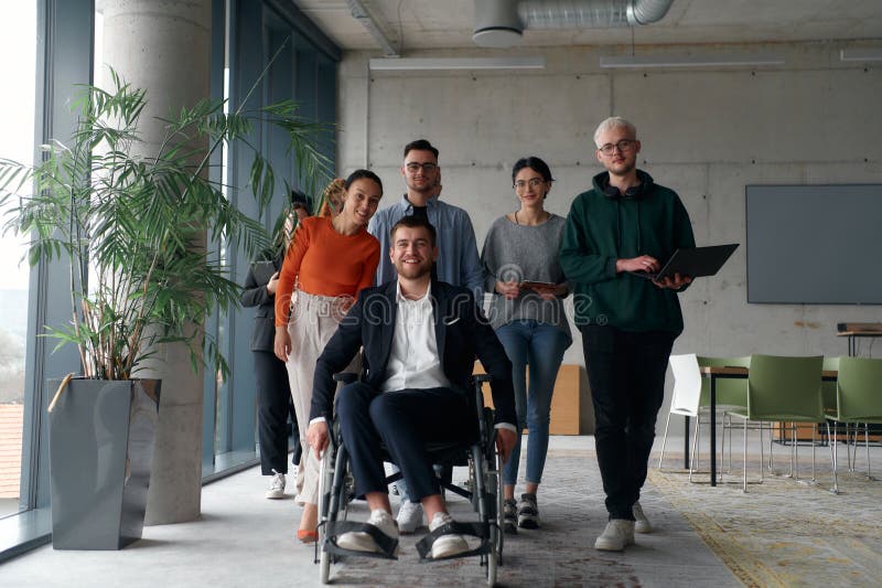 A Diverse Group of Business Professionals Walking Together through the ...