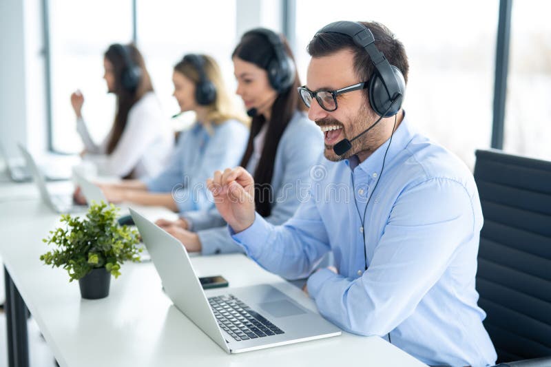 Diverse Group of Business Professionals Working Together at Office ...