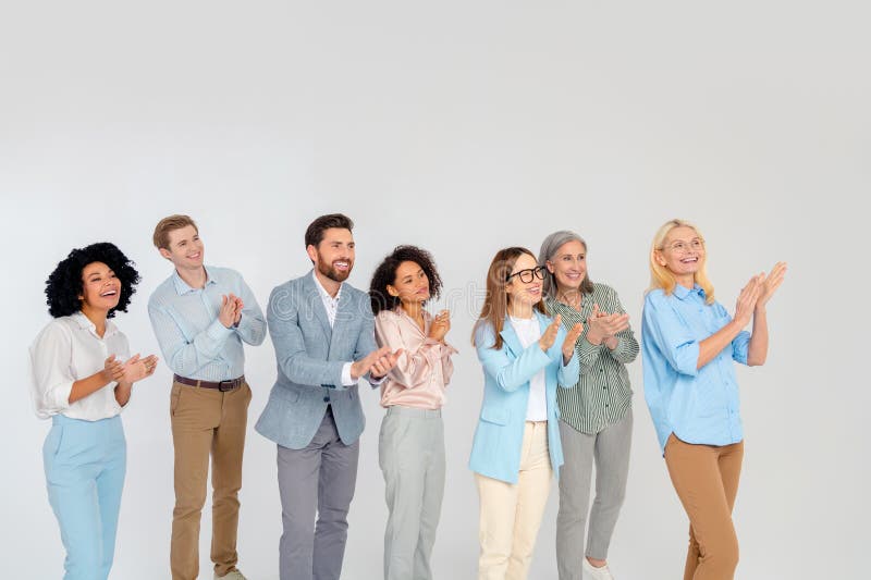 Group of Diverse Business Professionals Clapping Together in a ...