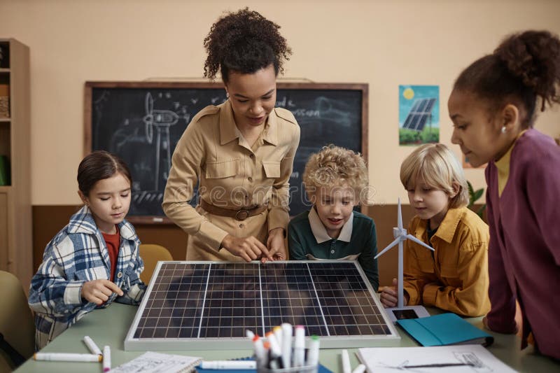 Diverse Group of Children Learning about Renewable Energy Stock Photo ...