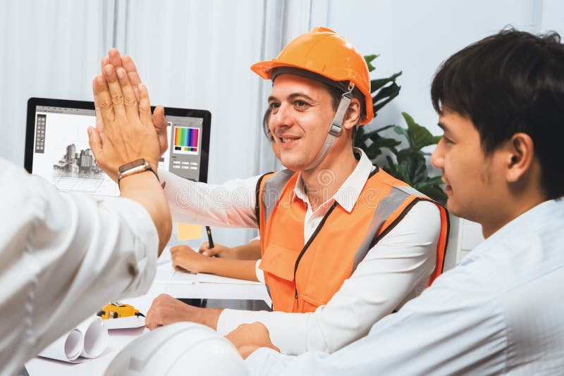 Diverse Group of Civil Engineer and Client Celebrate and High Five ...