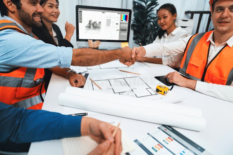 Diverse Group of Civil Engineer and Client Celebrate and High Five ...