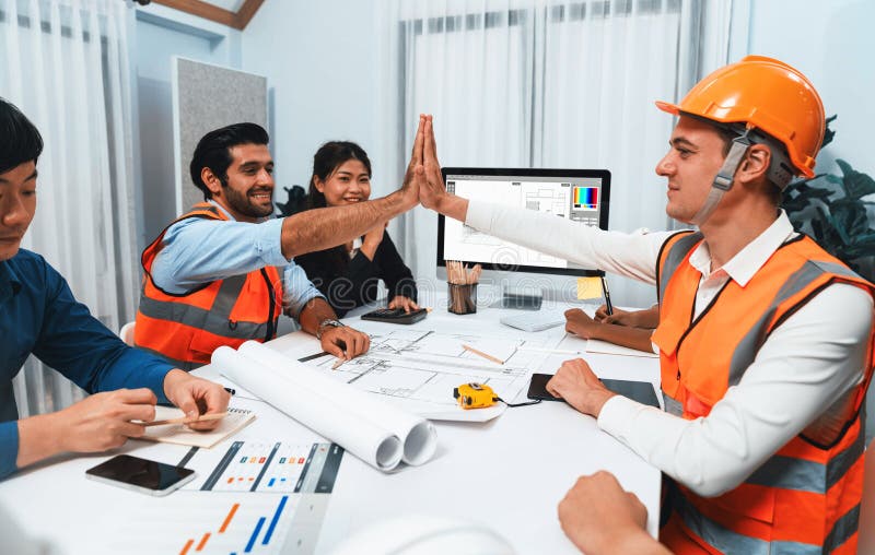 Diverse Group of Civil Engineer and Client Celebrate and High Five ...