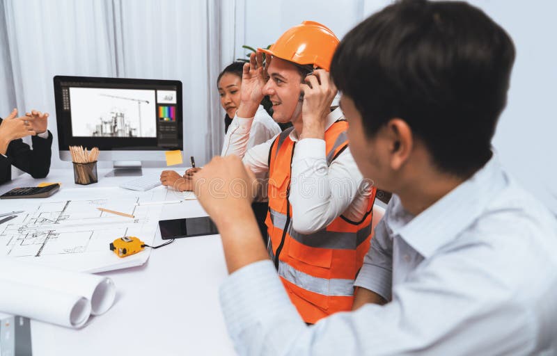 Diverse Group of Civil Engineer and Client Celebrate and High Five ...