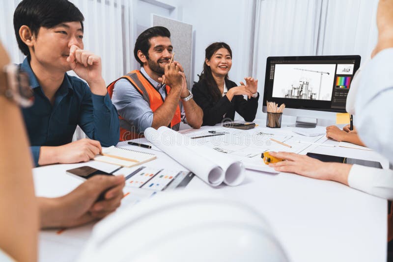 Diverse Group of Civil Engineer and Client Celebrate and High Five ...