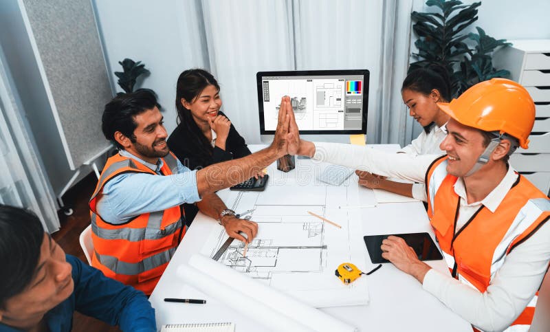 Diverse Group of Civil Engineer and Client Celebrate and High Five ...