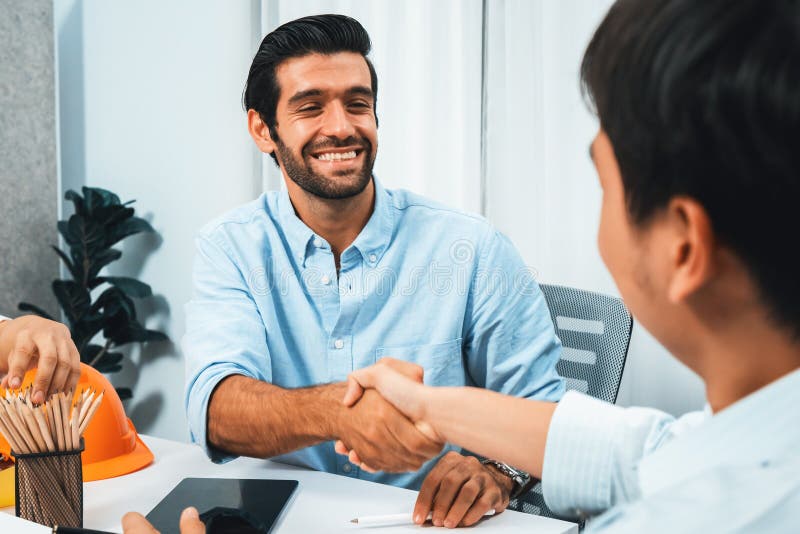 Diverse Group of Civil Engineer and Client Shakes Hand after. Prudent ...