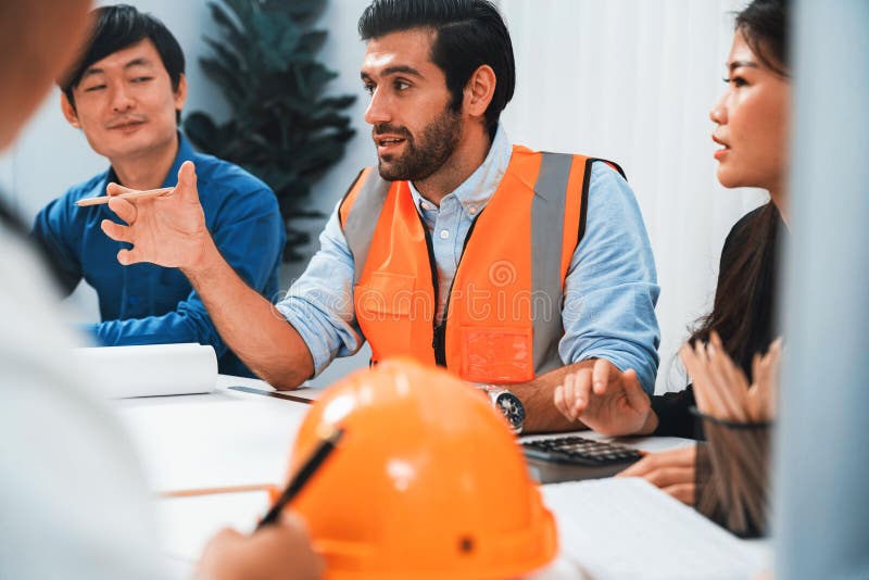 Diverse Group of Civil Engineer and Client Working on Architect ...