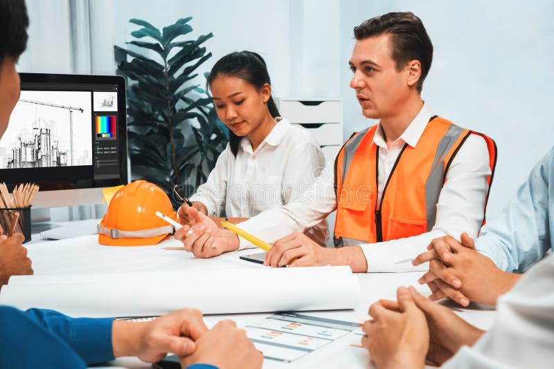 Diverse Group of Civil Engineer and Client Working on Architect ...