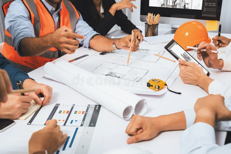 Diverse Group of Civil Engineer and Client Working on Architect ...