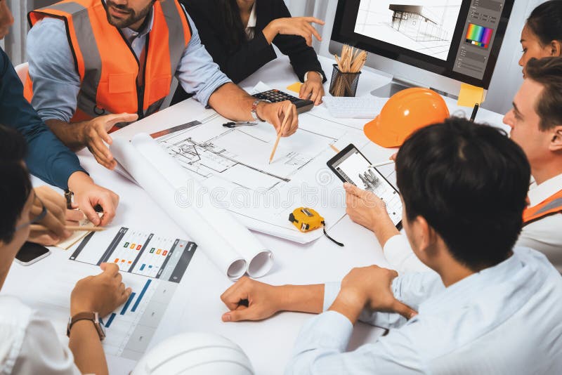 Diverse Group of Civil Engineer and Client Working on Architect ...