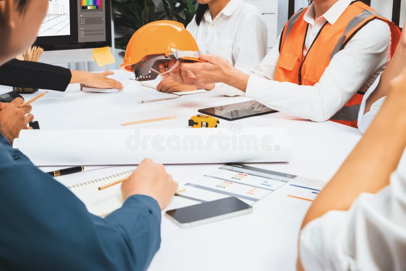 Diverse Group of Civil Engineer and Client Working on Architect ...