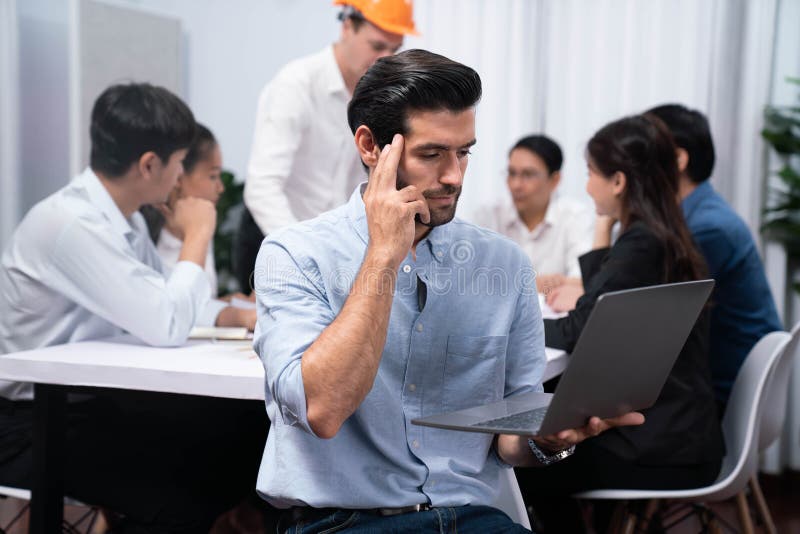 Diverse Group of Civil Engineer and Client Working on Architect ...