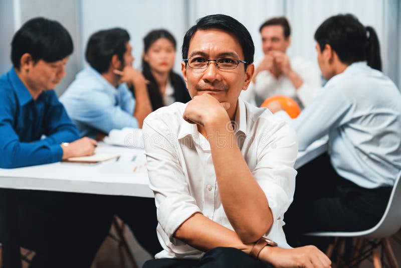 Diverse Group of Civil Engineer and Client Working on Architect ...