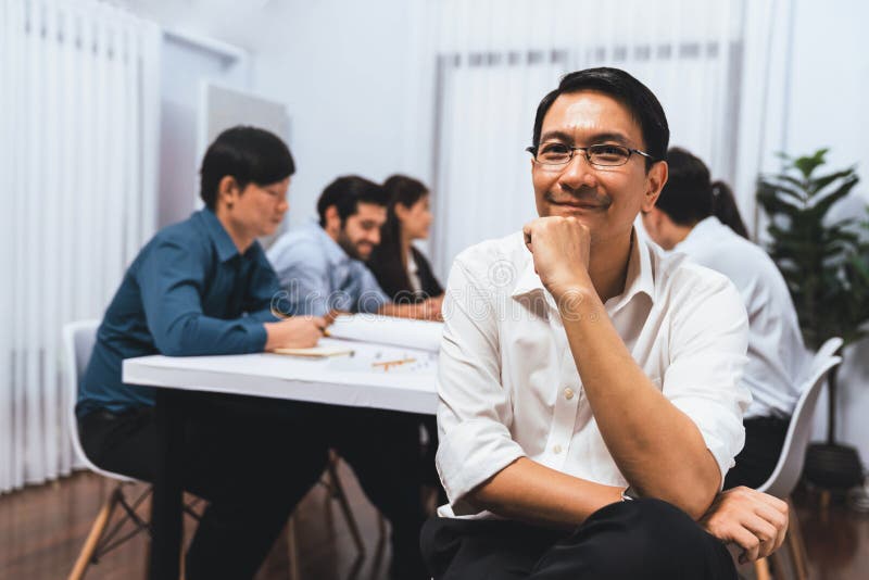 Diverse Group of Civil Engineer and Client Working on Architect ...