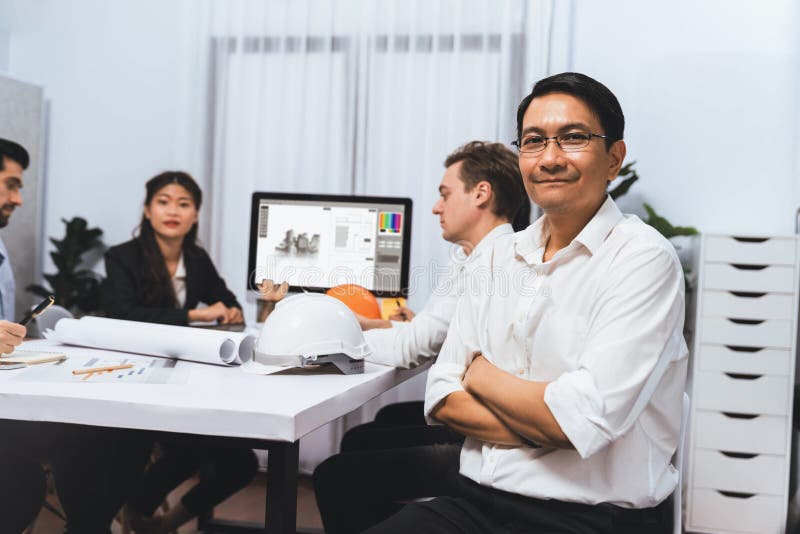 Diverse Group of Civil Engineer and Client Working on Architect ...