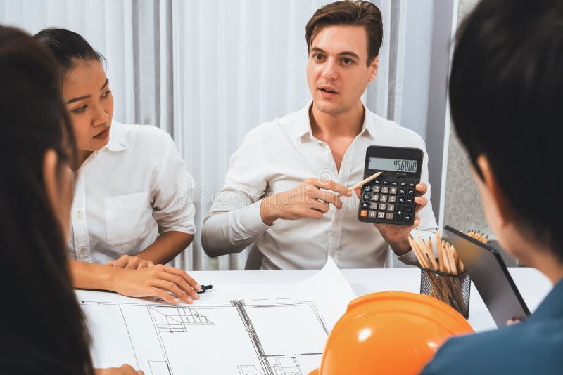 Diverse Group of Civil Engineer and Client Working on Architect ...