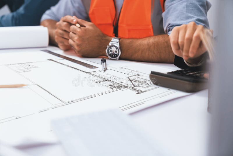 Diverse Group of Civil Engineer and Client Working on Architect ...