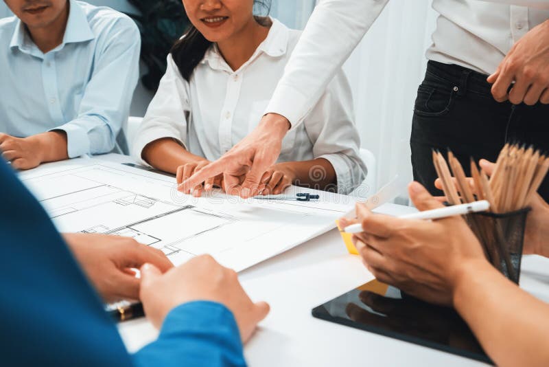 Diverse Group of Civil Engineer and Client Working on Architect ...