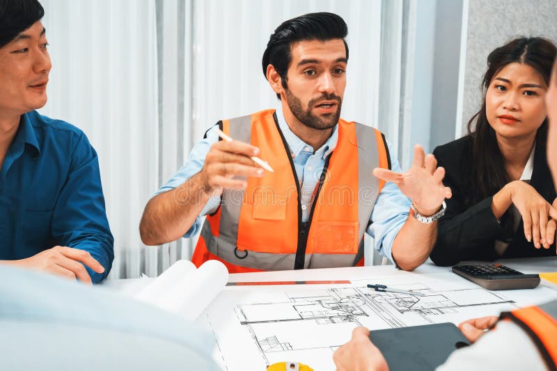 Diverse Group of Civil Engineer and Client Working on Architect ...