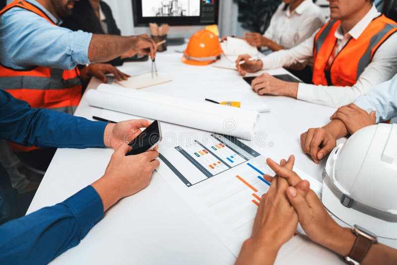 Diverse Group of Civil Engineer and Client Working on Architect ...