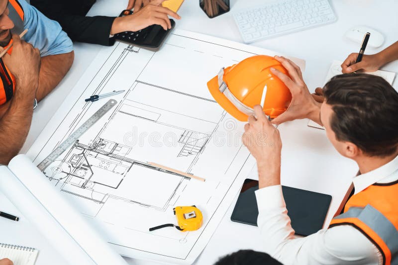 Diverse Group of Civil Engineer and Client Working on Architect ...