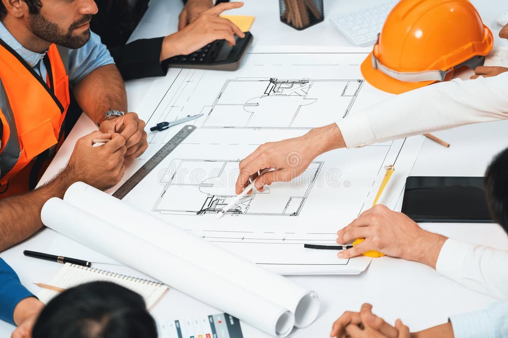 Diverse Group of Civil Engineer and Client Working on Architect ...