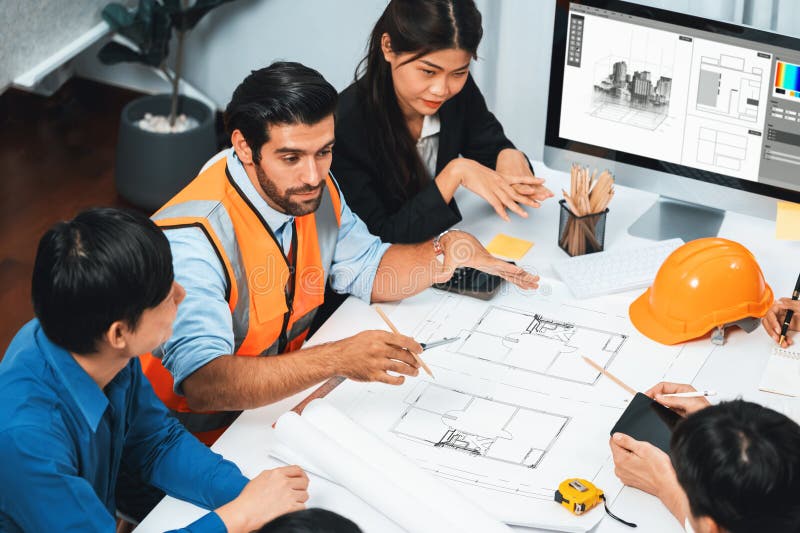 Diverse Group of Civil Engineer and Client Working on Architect ...