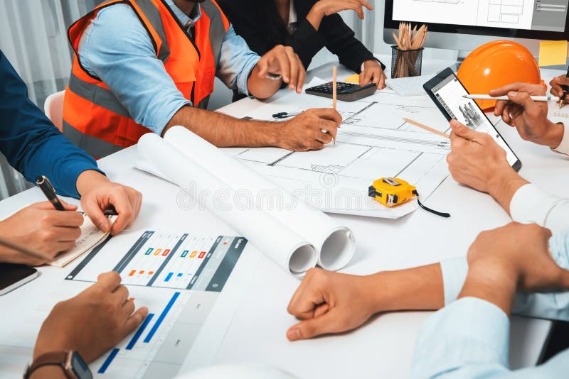 Diverse Group of Civil Engineer and Client Working on Architect ...