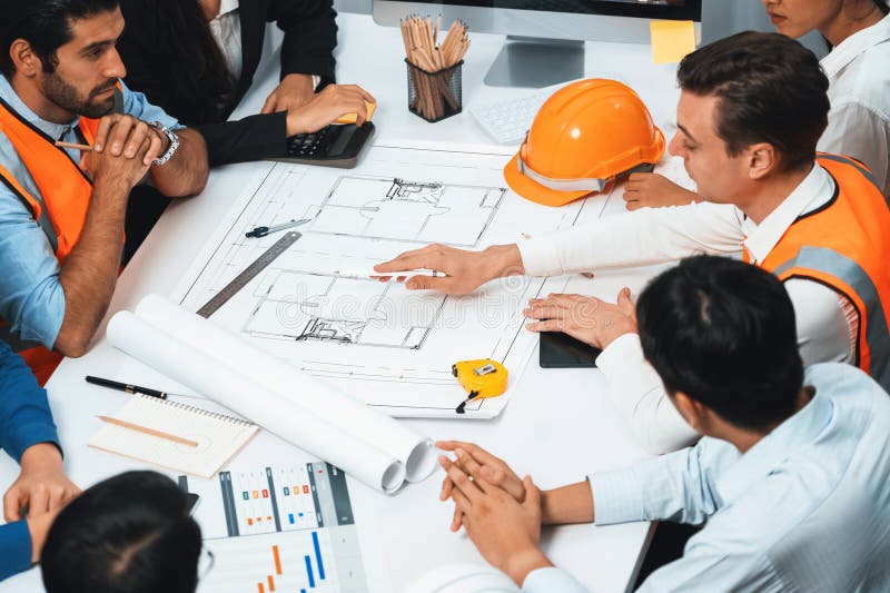 Diverse Group of Civil Engineer and Client Working on Architect ...