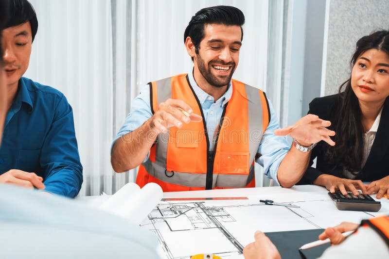 Diverse Group of Civil Engineer and Client Working on Architect ...