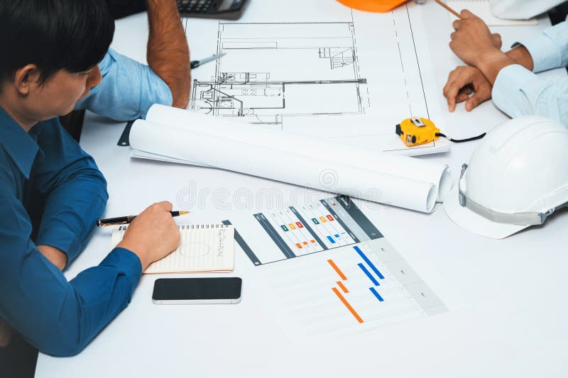 Diverse Group of Civil Engineer and Client Working on Architect ...