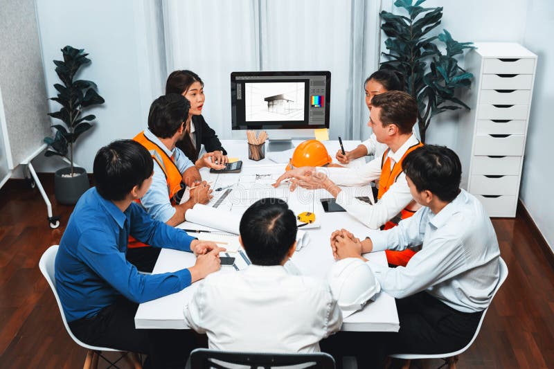 Diverse Group of Civil Engineer and Client Working on Architect ...