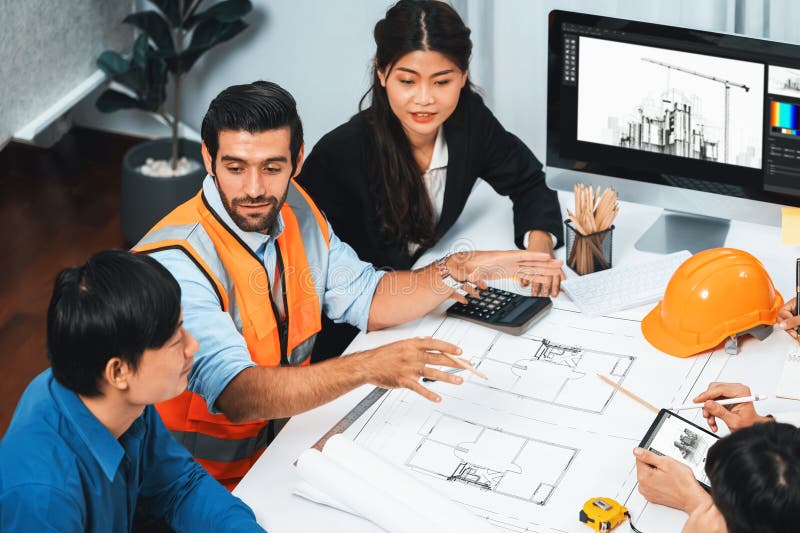 Diverse Group of Civil Engineer and Client Working on Architect ...