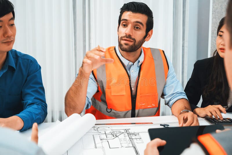 Diverse Group of Civil Engineer and Client Working on Architect ...