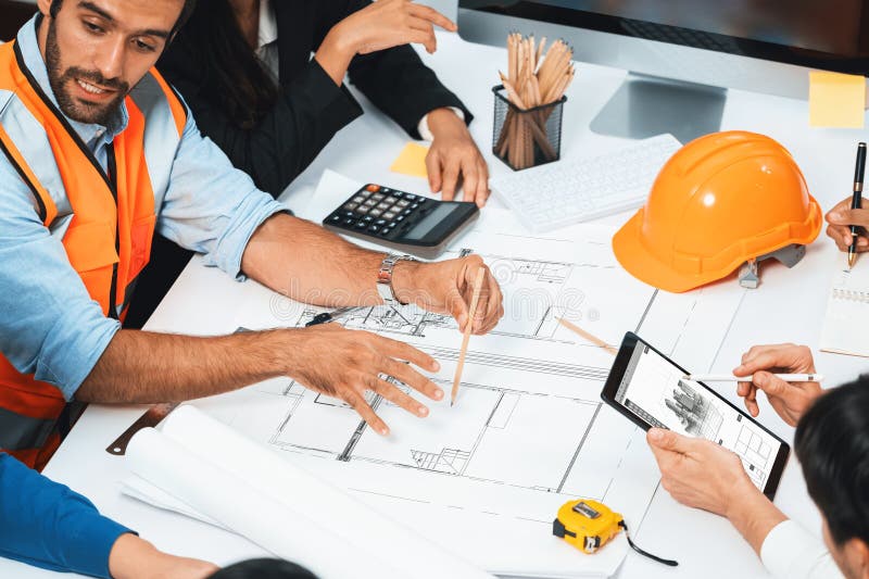 Diverse Group of Civil Engineer and Client Working on Architect ...