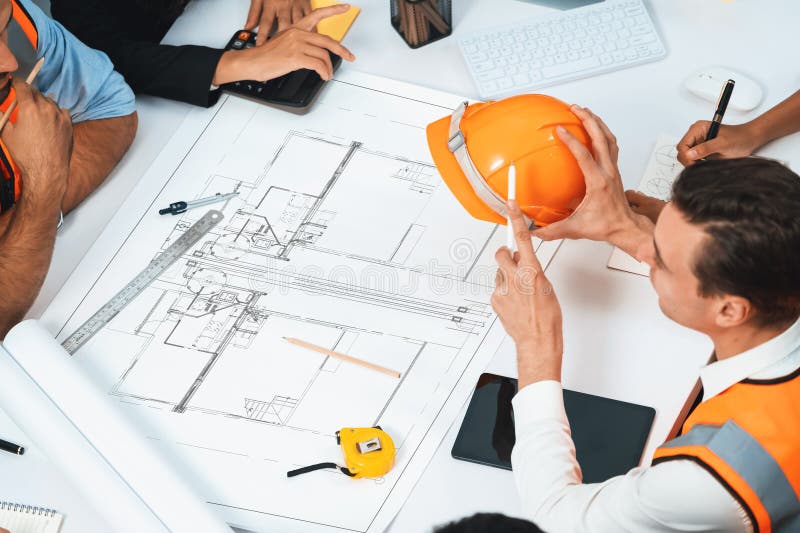 Diverse Group of Civil Engineer and Client Working on Architect ...