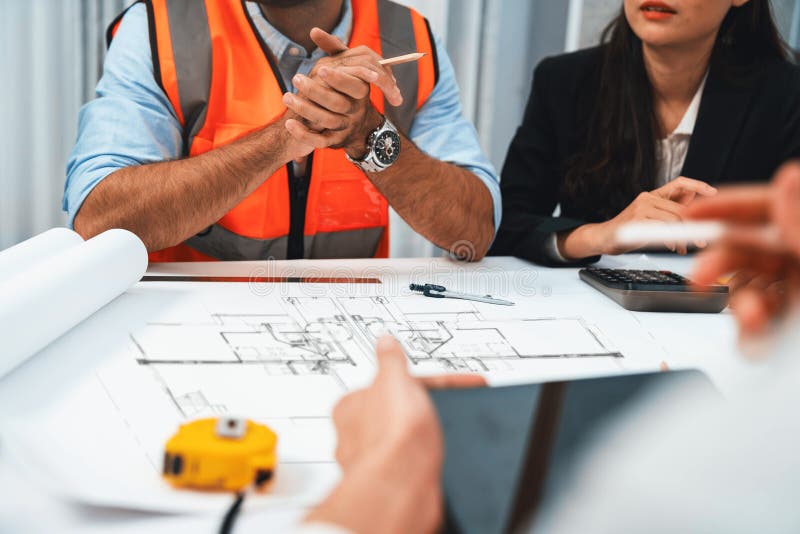 Diverse Group of Civil Engineer and Client Working on Architect ...